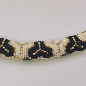 White, Black, and Golden Geometric Pattern Necklace, Ornamented Bead ...