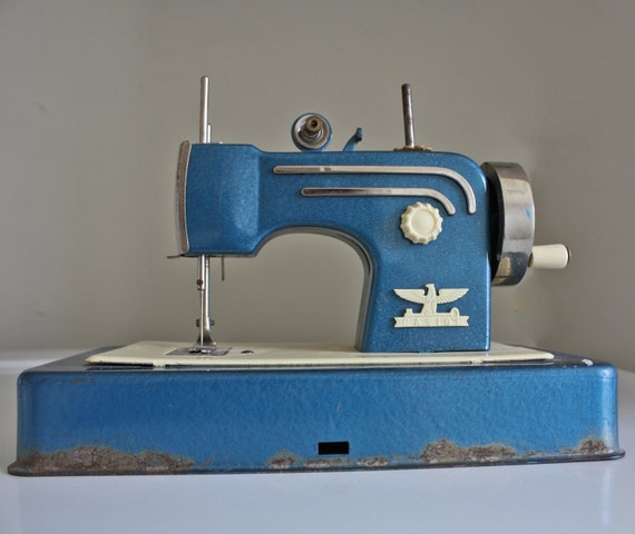 Items similar to Casige German toy sewing machine on Etsy