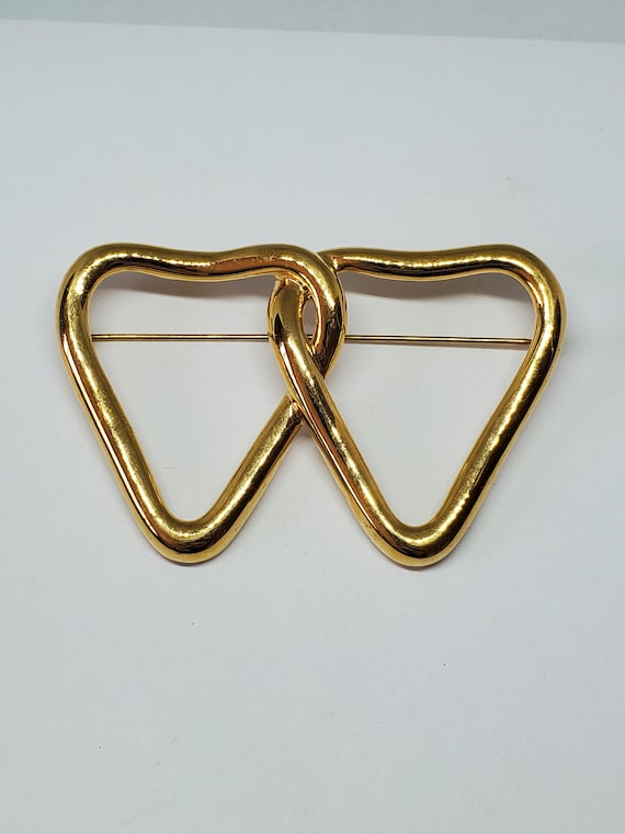 gold tone interlocking - Gem