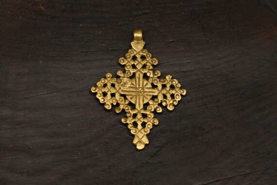 Lot EIGHTEEN KARAT GOLD ETHIOPIAN COPTIC CROSS PENDANT, 60% OFF