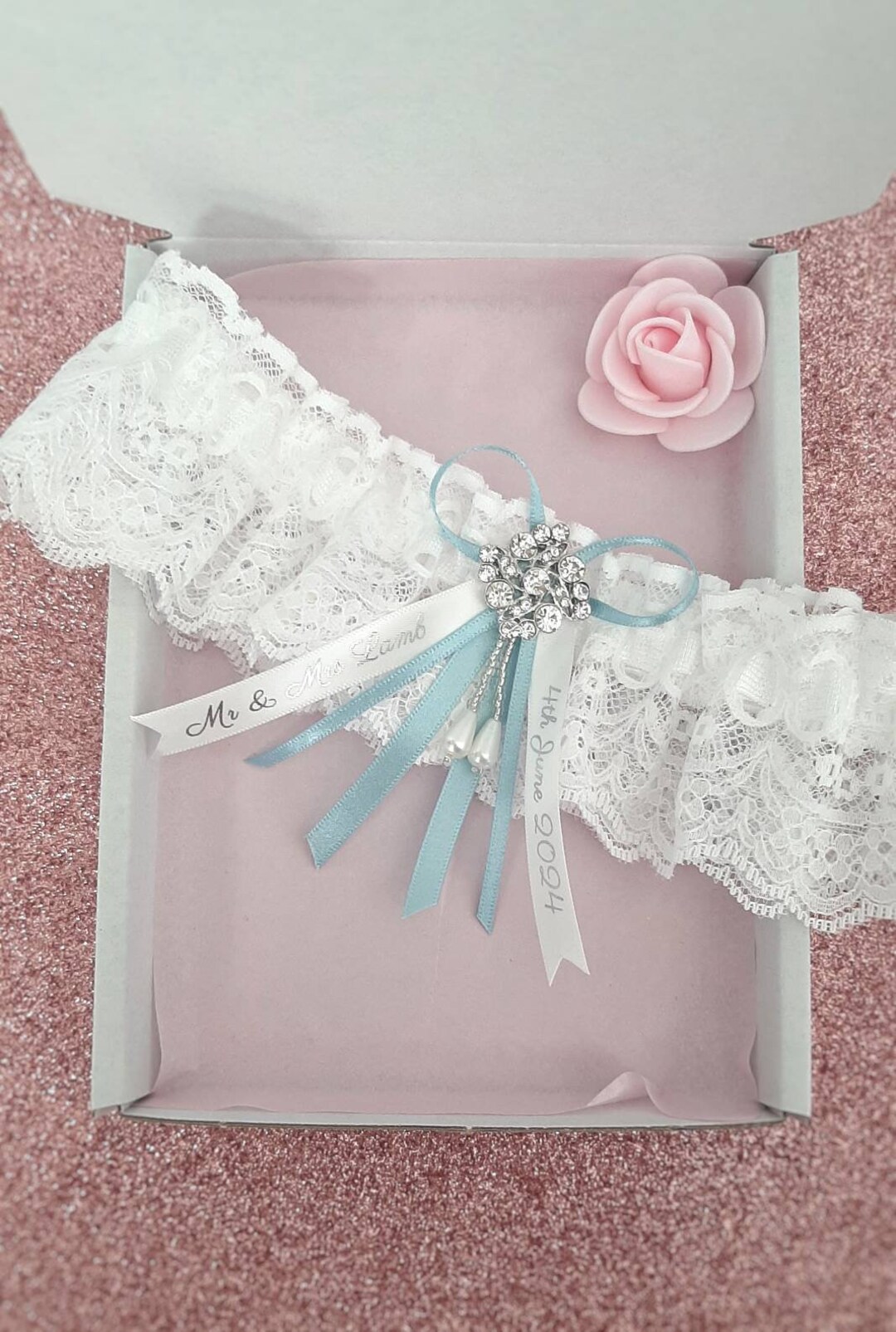 Personalised Light Blue Wedding Garter: Rhinestone Centre, Silver Text ...