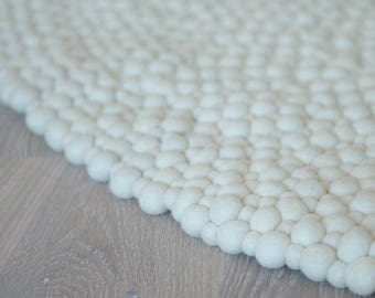 Quality Felt ball rugs Balls & Cat caves from Nepal. by feltnyarn