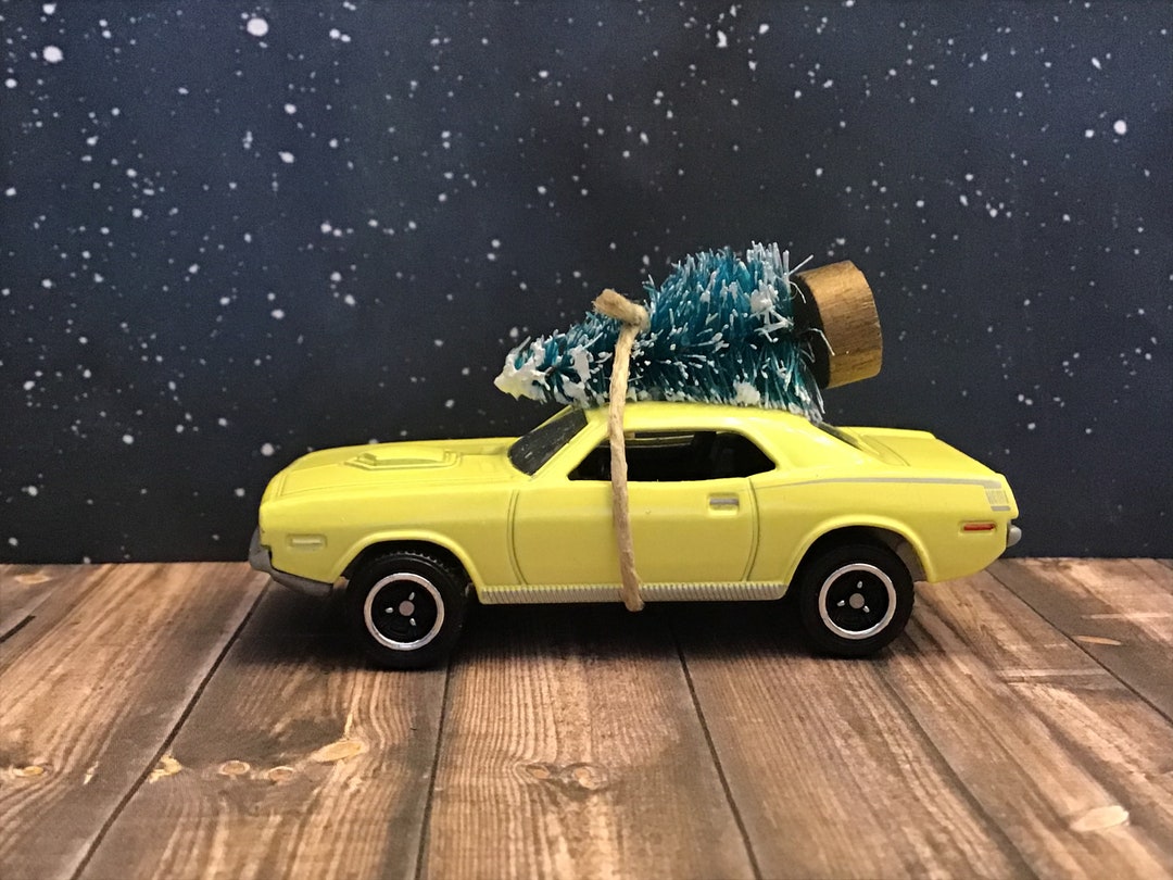 Plymouth Cuda Carrying Christmas Tree, Yellow 1970 Plymouth Cuda ...