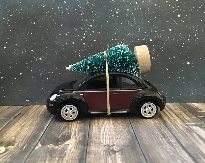 VW Bug Carrying Christmas Tree, Vintage New 2001 Black Volkswagon Bug ...