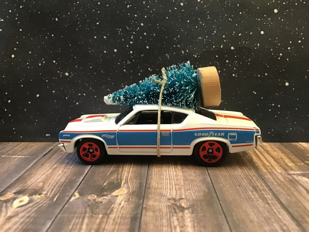 AMC Rebel Machine Carrying Christmas Tree, White AMC Rebel Car ...