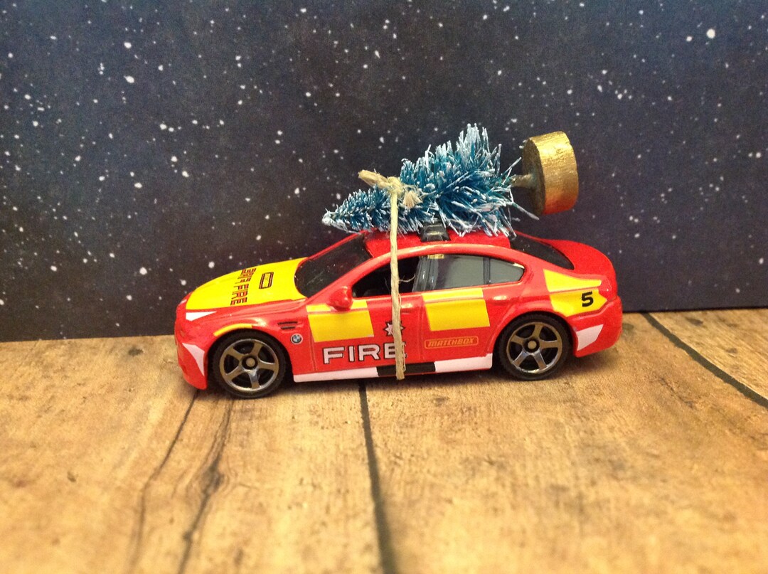 Fire Rescue Car Carrying Christmas Tree, Red Fire Rescue BMW Christmas ...