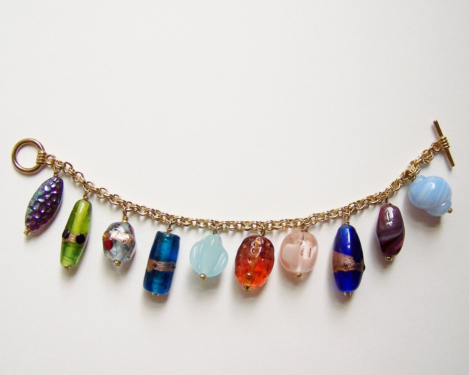GLASS CHARM BRACELET - 10 Colorful & Distinctive Handmade Glass Beads ...