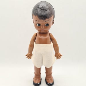 Side Eye Plastic Doll - Etsy