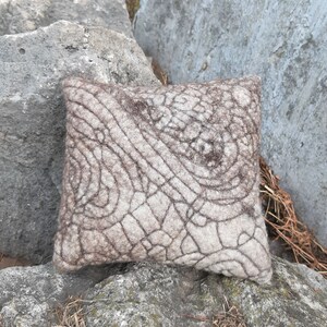 The song of hemispheres felt chopper stone mini pillow | Etsy