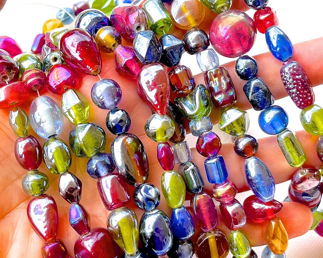 SUPPLY: 24" Strand of Mixed Shape Luster Glass Beads - Assorted Shapes ...