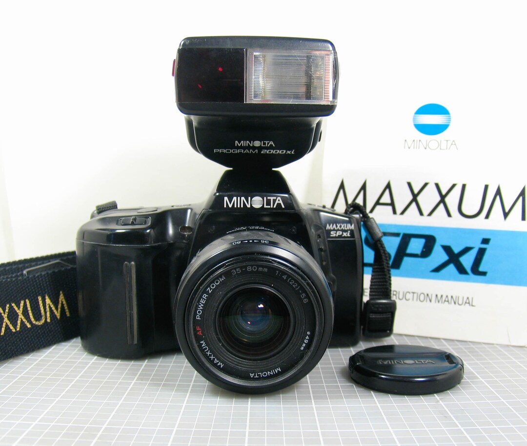 Minolta Maxxum Spxi 35mm SLR Film Camera With an AF 35-80mm Power Zoom Lens and a Program 2000xi ...