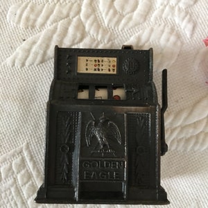 Vintage Cast Iron Pencil Sharpener. Old Slot Machine With Moveable Arm ...