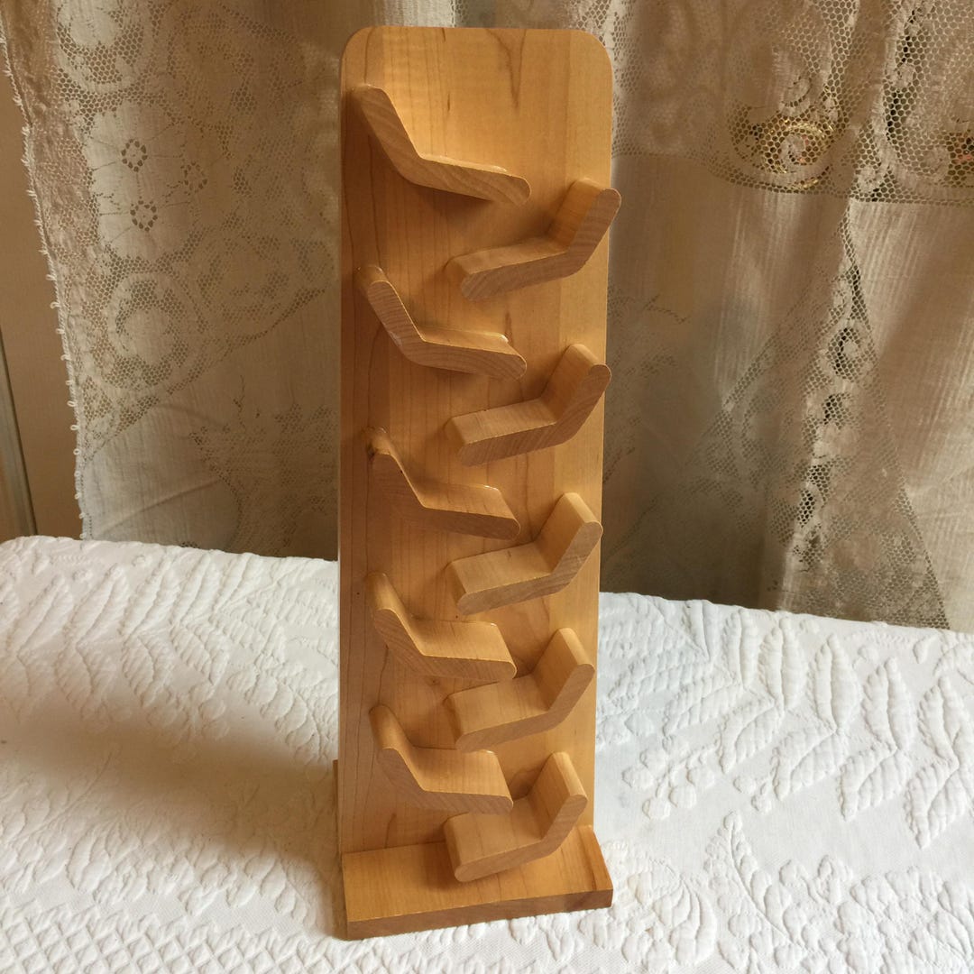 Hand Made Marble Roller. Wooden Tower With Stacked Lounge Chair Style ...