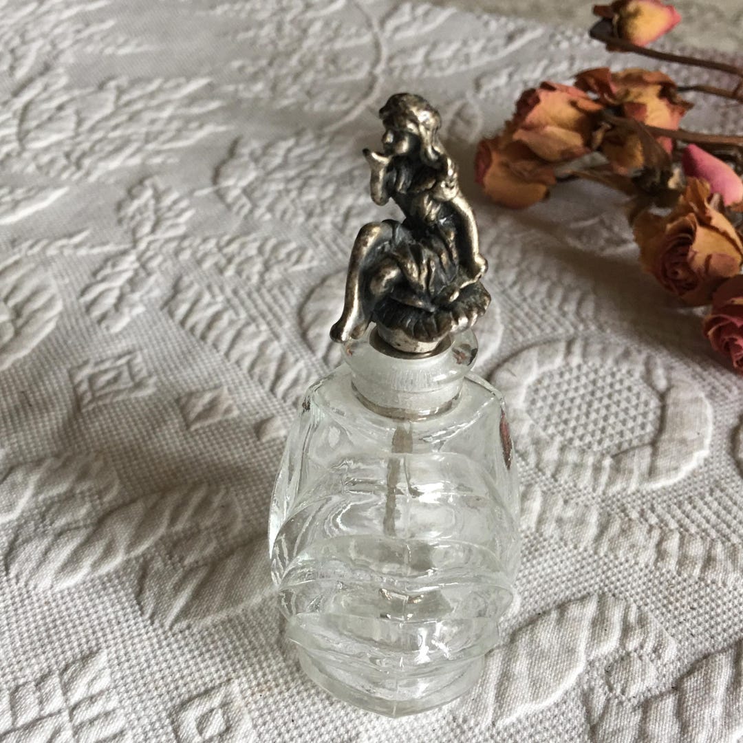 Vintage Perfume Bottle With Metal Wand for Application. Lady Sitting on ...