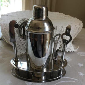 Vintage Bar Set in Stainless Steel. Can Openers, Corkscrew, Cutter and ...