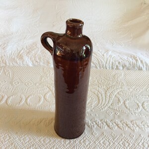 Vintage Stoneware Brown Bottle With Side Handle. Close With Cork ...
