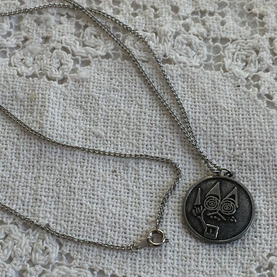 Vintage Fine Pewter Circle Pendent with Face and Fist… - Gem