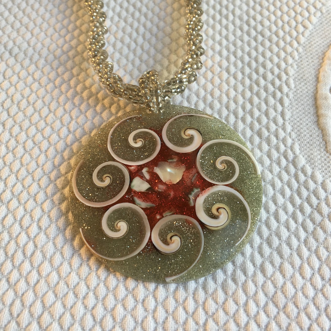 Vintage Resin Round Pendant With Swirling Designs and Beaded Cord ...