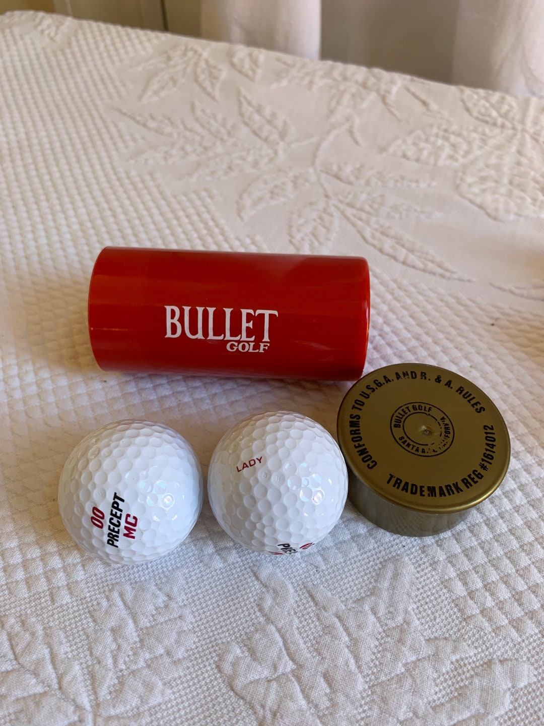 Vintage Golf Balls in Van Leeuwen Pipe and Tube Plastic Container. 2 ...