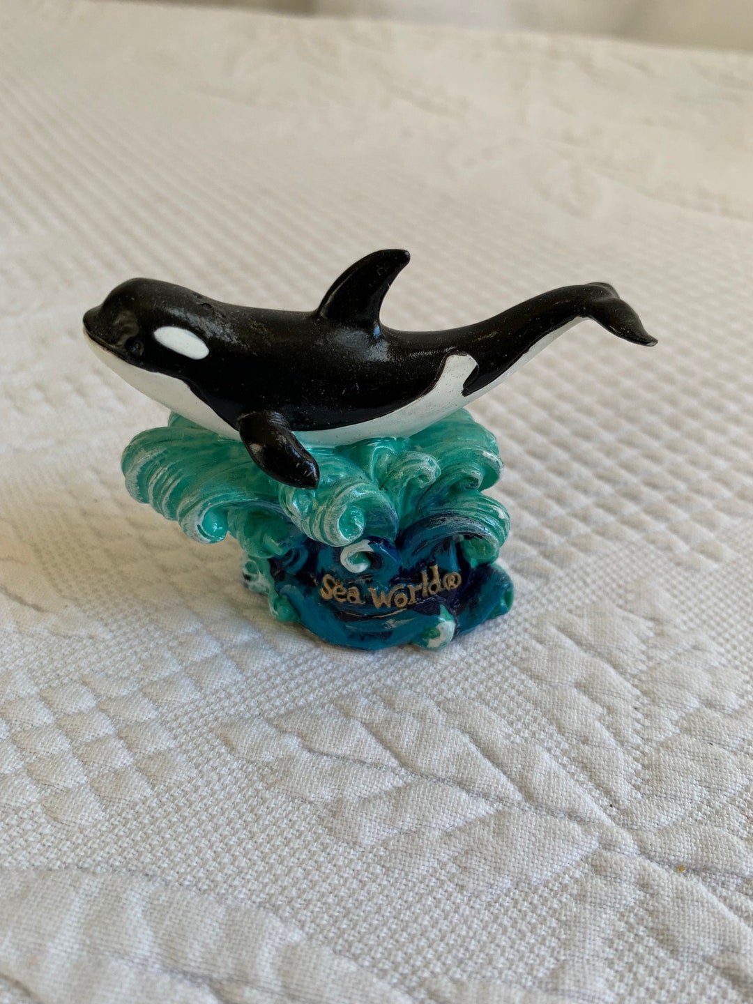 Sea World Whale Souvenir Figurine. Blue Curly Cue Water Waves With ...