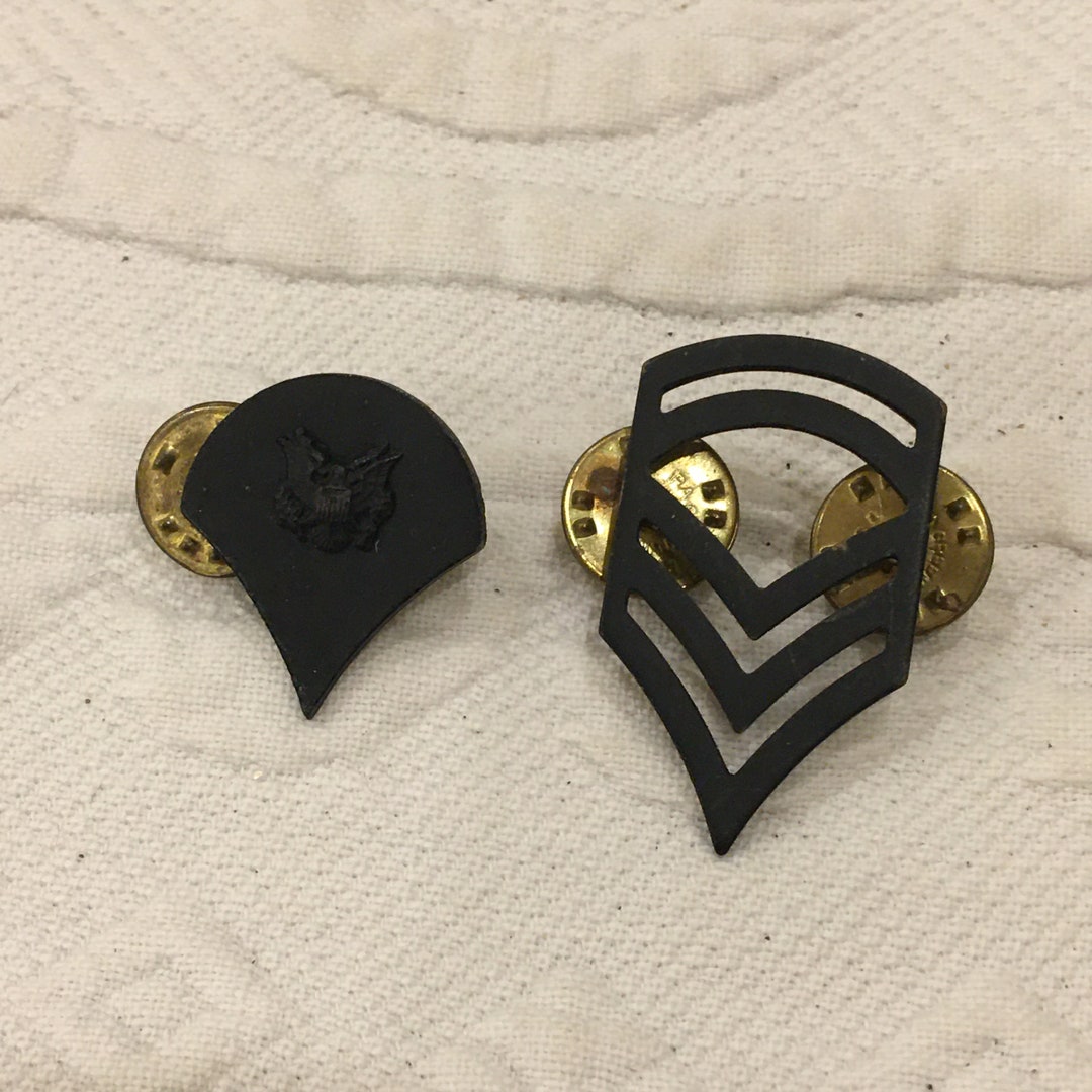 Vintage US Army Shield and Chevron Lapel or Hat Pins. the Shield is ...
