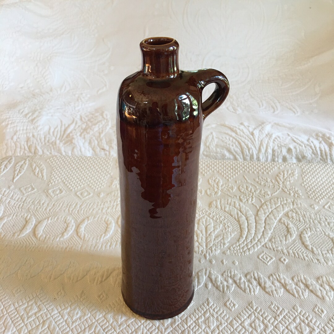 Vintage Stoneware Brown Bottle With Side Handle. Close With Cork ...