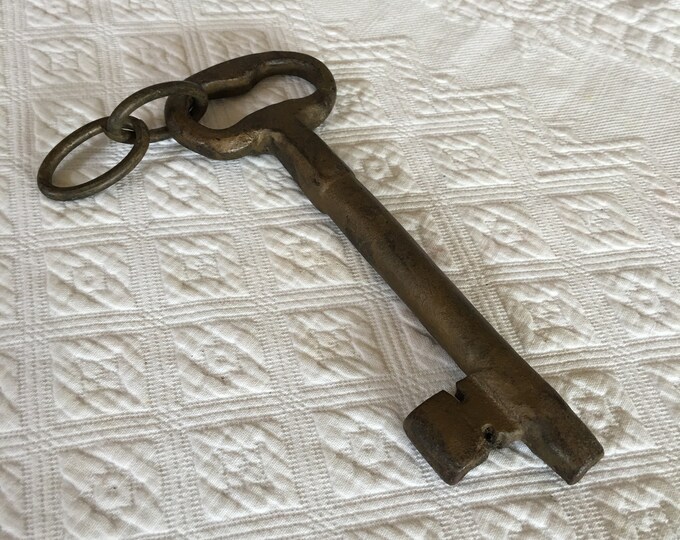 Vintage Cast Iron Key for Large Lock. Key Attached to Two Links in a ...