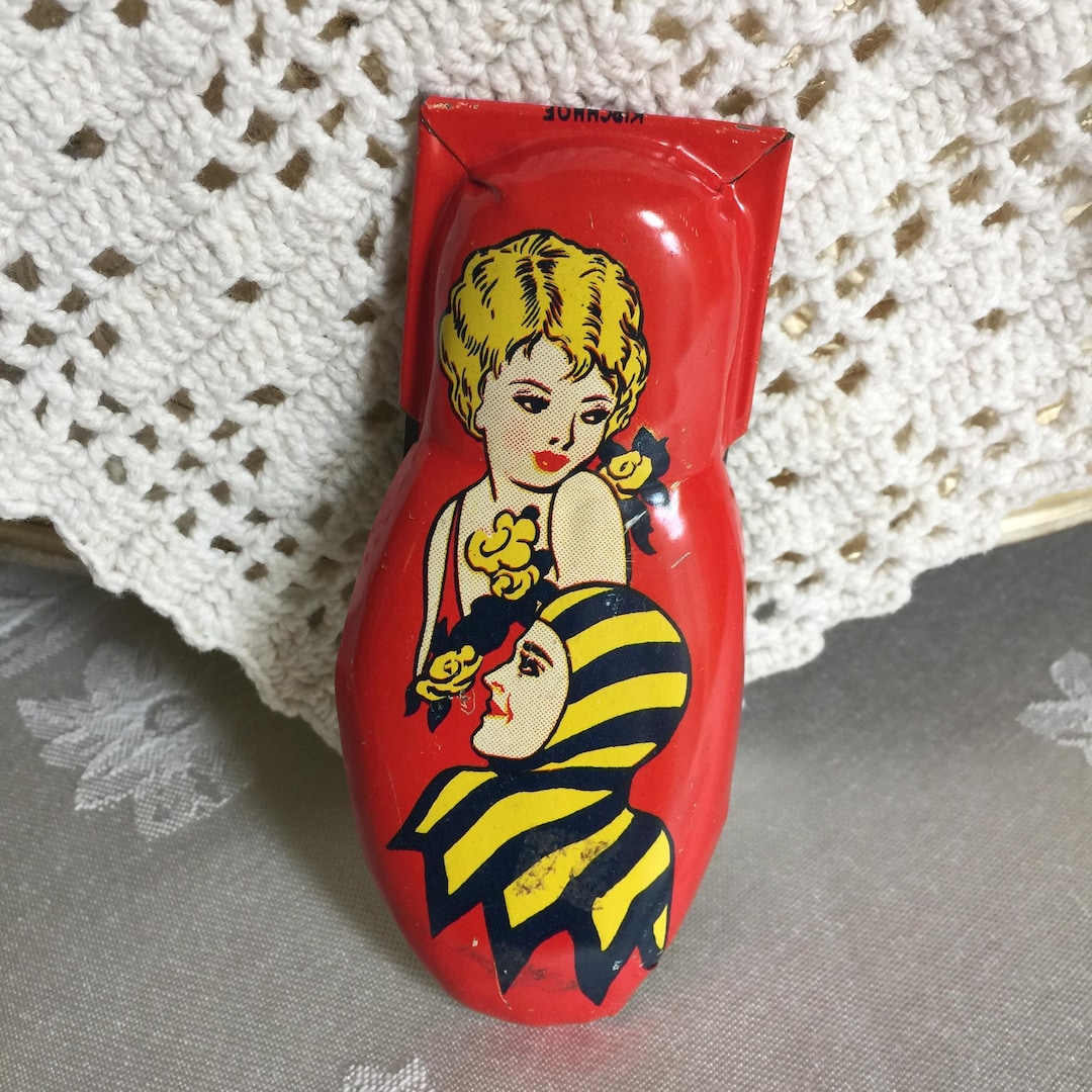 Vintage Metal Clacker Noise Maker for Celebrations. Jester and Lady on ...