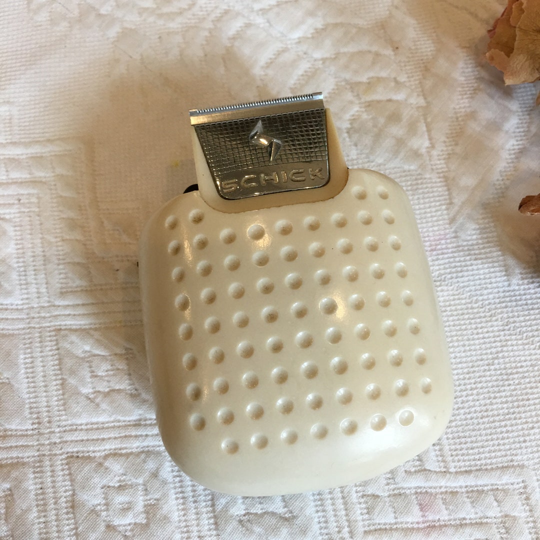 Vintage Schick Electric Razor From 1950s. Cream Color With Top Missing ...