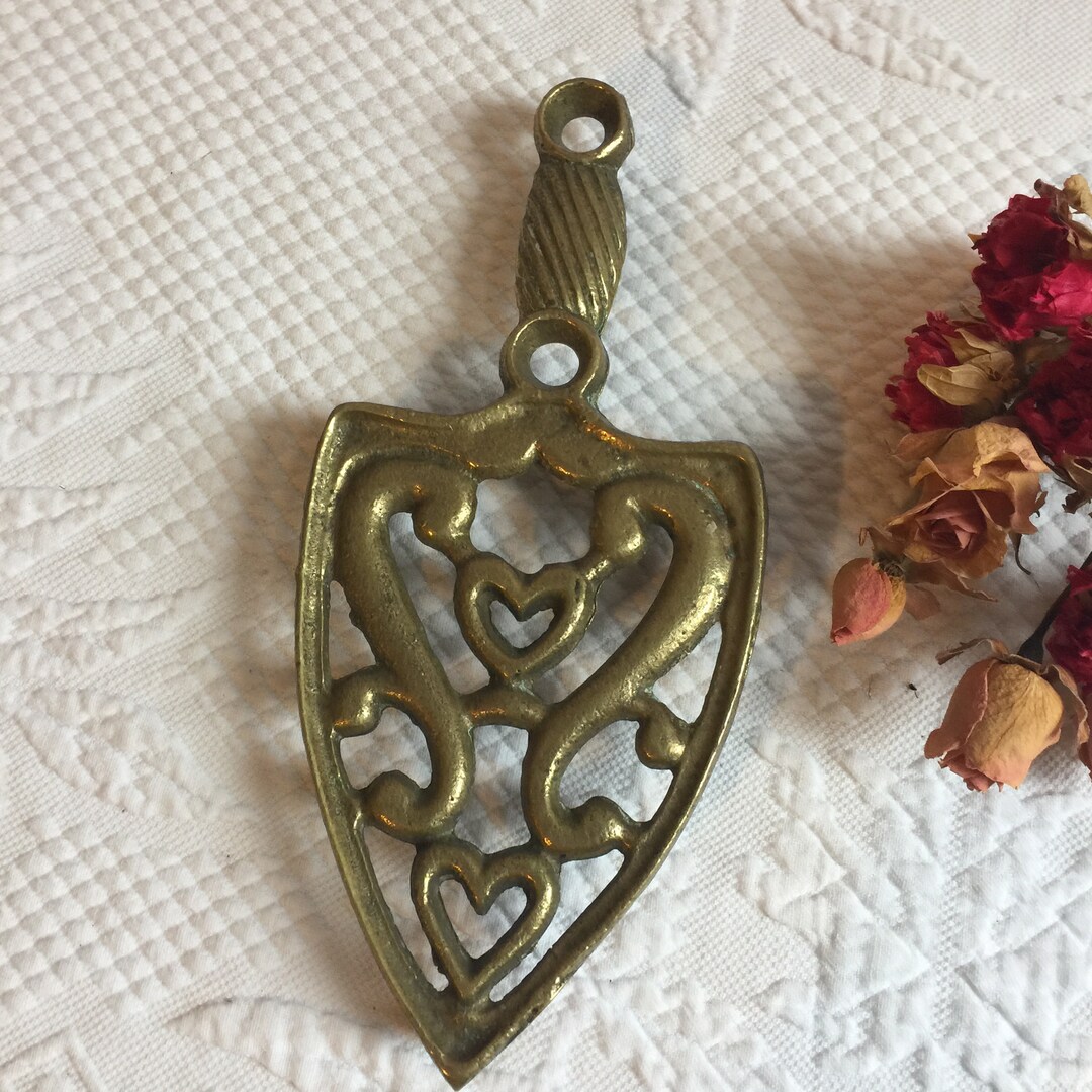 Vintage Cast Brass Three Legged Iron Shaped Trivet. Hearts and Swirling ...
