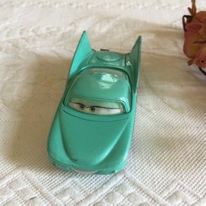 Vintage Disney Pixar Teal Car With Large Fins on Back. Car With Moving ...