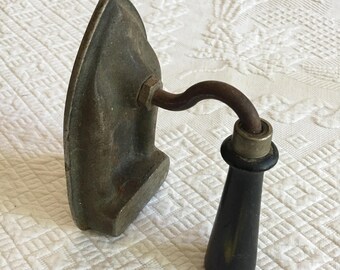 Antique Cast Iron No 8 Iron With Textured Handle and C Inside a Shield ...