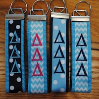 Devastating Diva Customized Triple Layered Acrylic Keychain With Charms ...