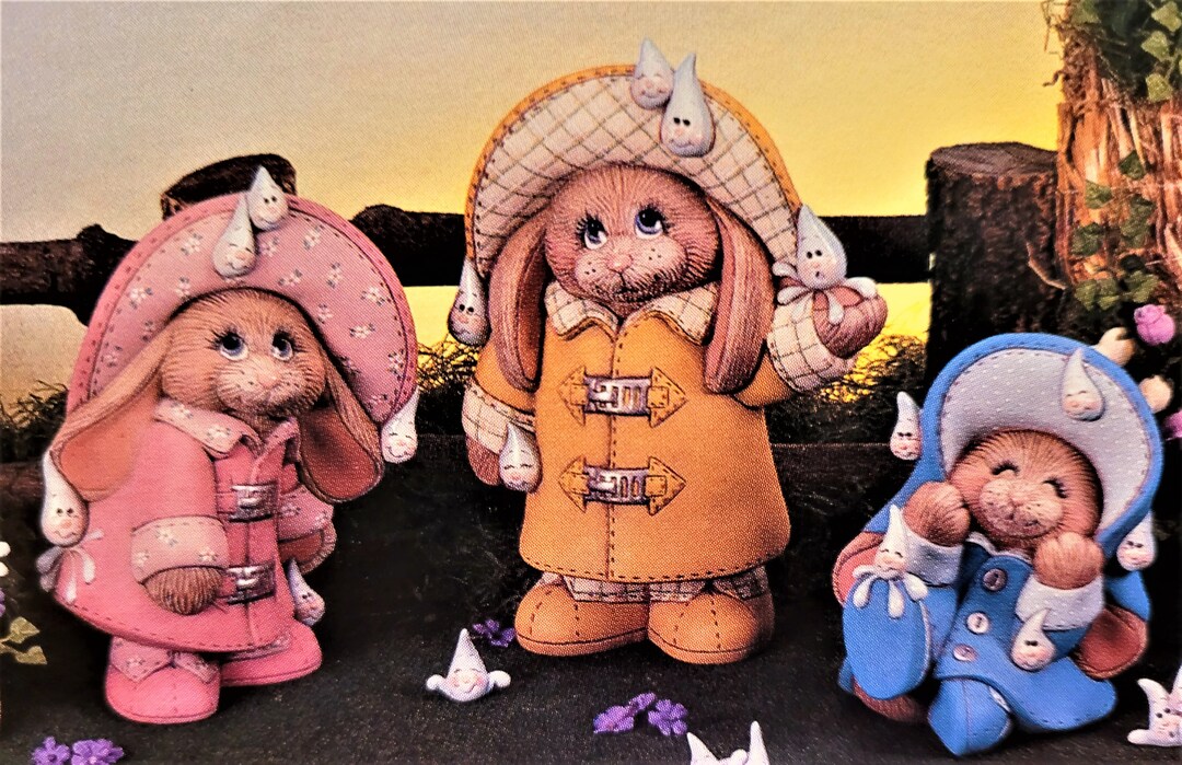 Unpainted Ceramic Set of 3 Bunnies in Raincoats Puddle Bunnies ...