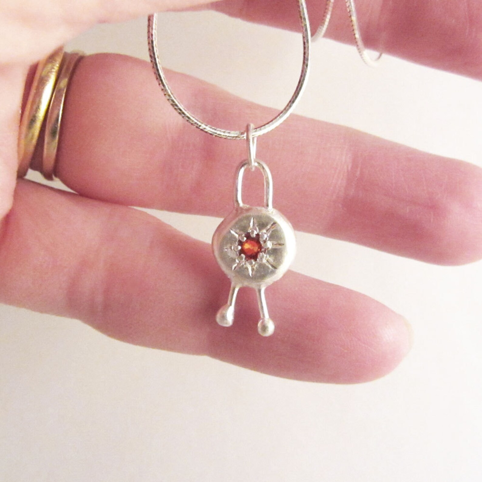 Sterling Silver Pebble Charm Necklace With Orange Sapphire and Antennae ...