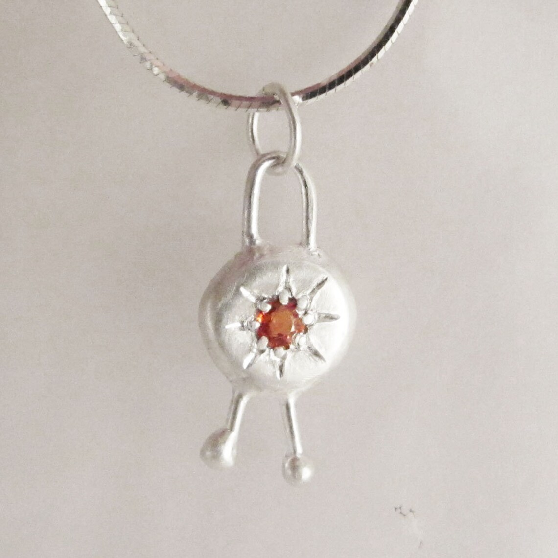 Sterling Silver Pebble Charm Necklace With Orange Sapphire and Antennae ...