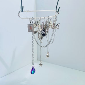 Silver Locket and Metal Safety Pin Brooch With Dangling Chain, Charms ...