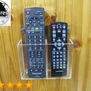 TWO TV Cable or Satellite Decoder Receiver Remote Controls Wall Holder ...