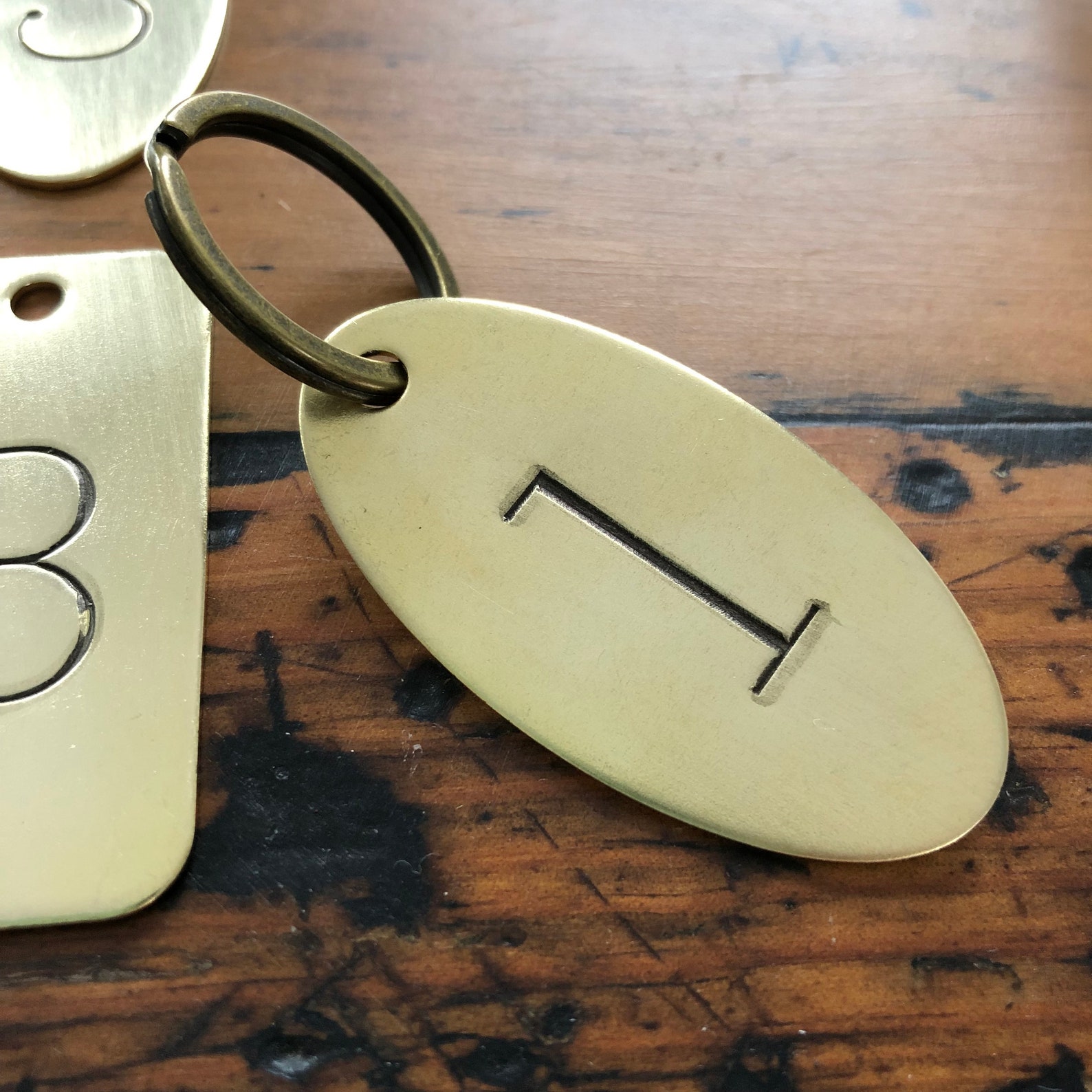 Hand Punched Brass Numbered Tags - Custom Numbered Locker Tags ...