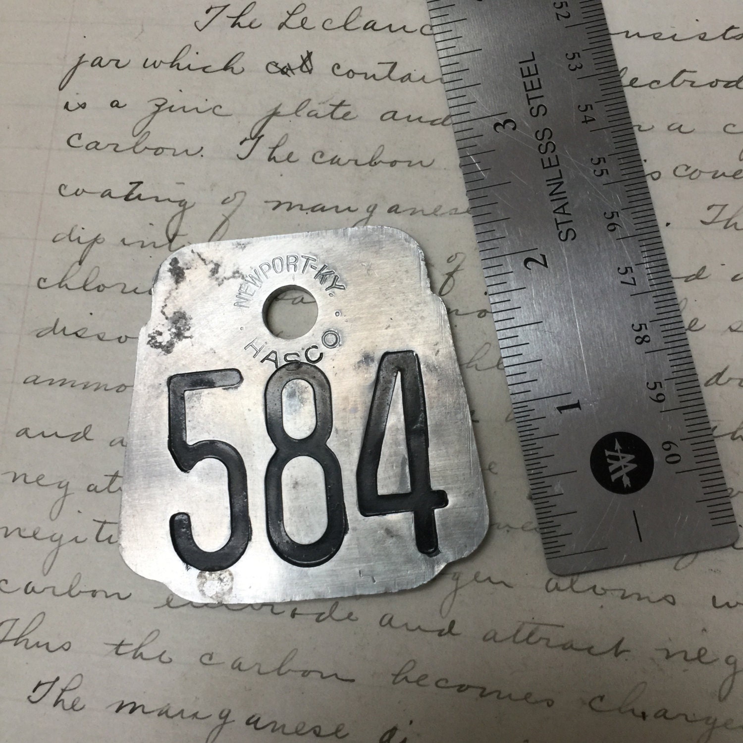 Vintage Aluminum cow tag – number 584 - antique metal livestock ID tag ...