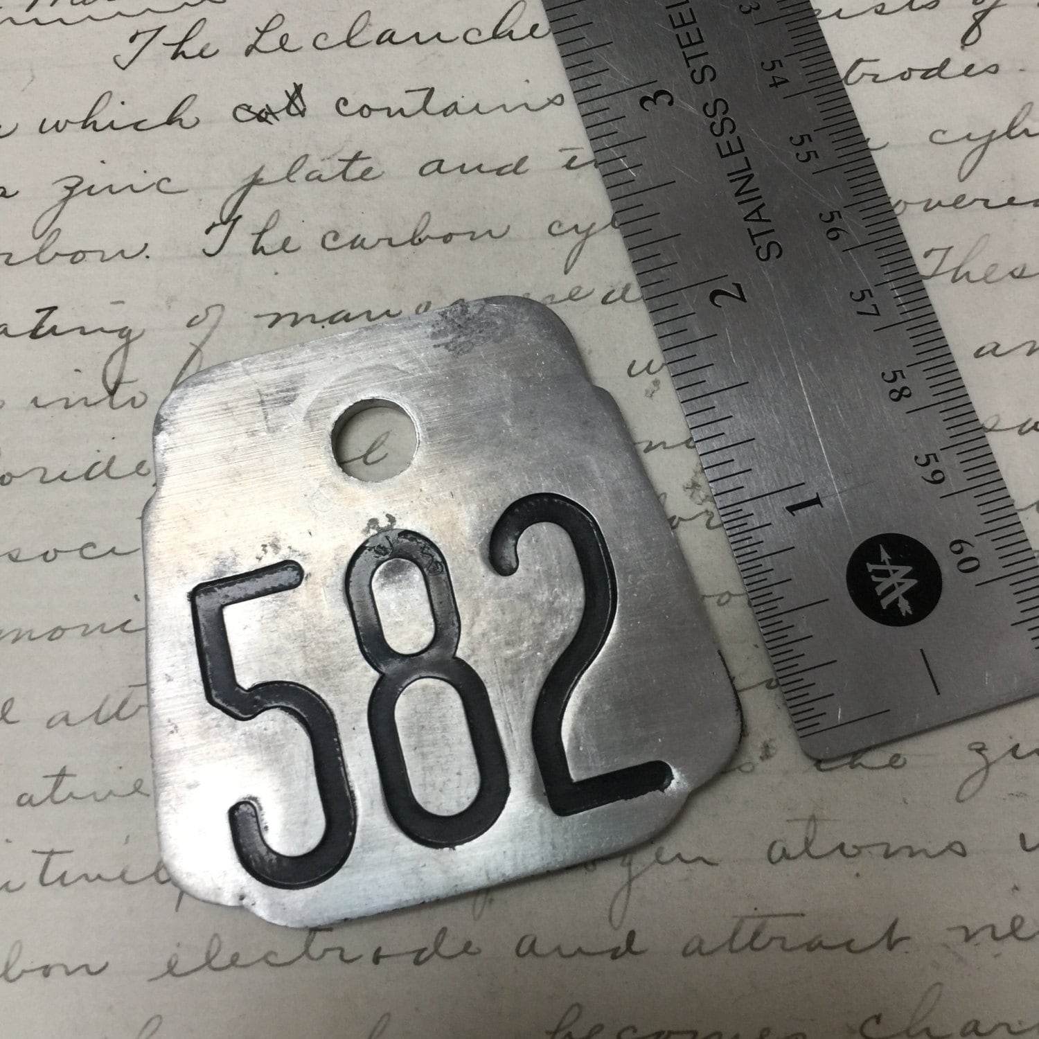 Vintage Aluminum cow tag – number 582 - antique metal livestock ID tag ...