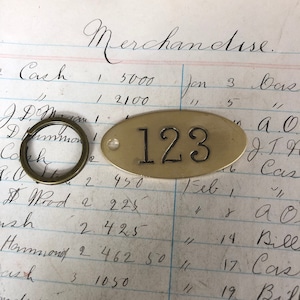 Hand Punched Brass Numbered Tags - Custom Numbered Locker Tags ...