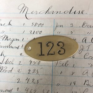 Hand Punched Brass Numbered Tags - Custom Numbered Locker Tags ...
