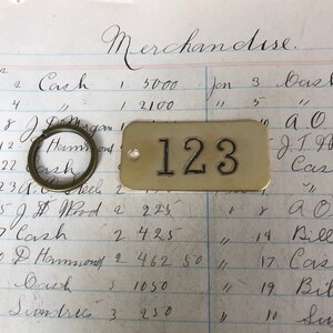 Hand Punched Brass Numbered Tags - Custom Numbered Locker Tags ...