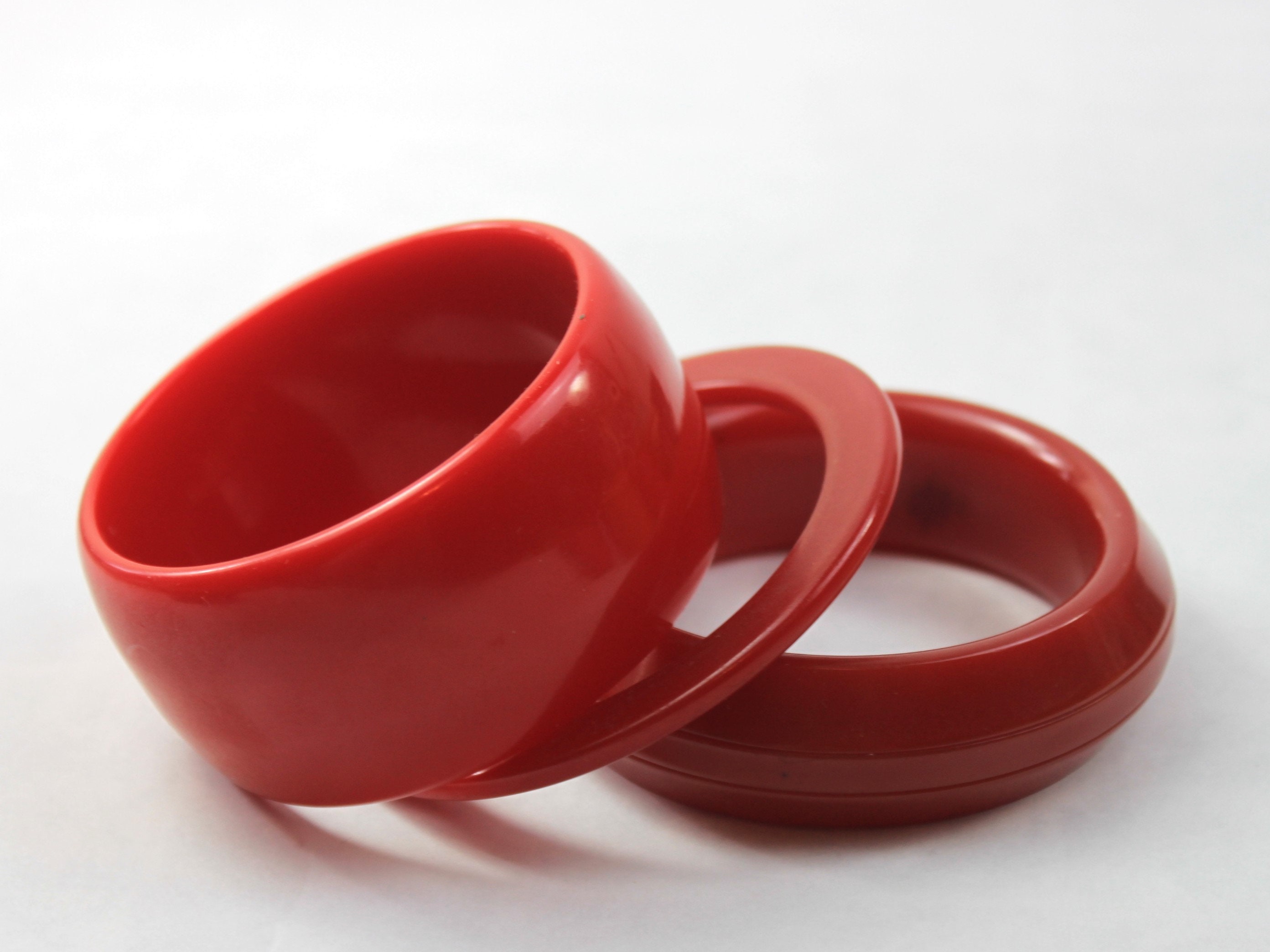 Bakelite Bangle Stack Set Cherry Red Wide Wall Slice and Carved Saucer ...