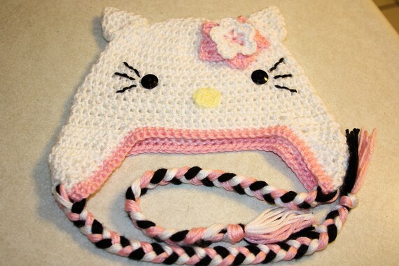 Items similar to White Hello Kitty Hat trimmed in Pink on Etsy