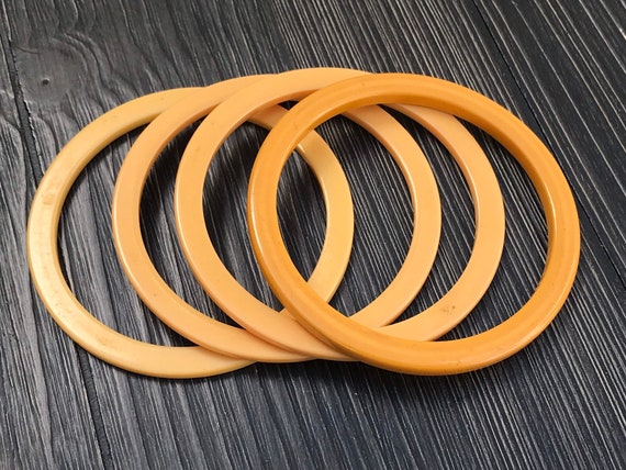 Vintage Bakelite Bangle Spacers Stack of Yellow Brace… - Gem