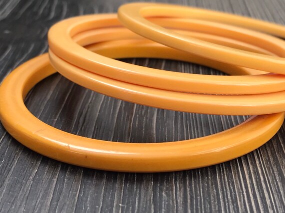 Vintage Bakelite Bangle Spacers Stack of Yellow Brace… - Gem