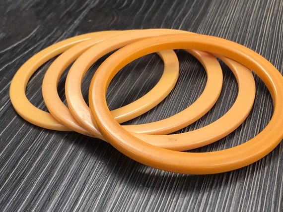 Vintage Bakelite Bangle Spacers Stack of Yellow Brace… - Gem