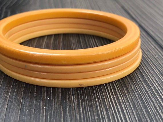 Vintage Bakelite Bangle Spacers Stack of Yellow Brace… - Gem